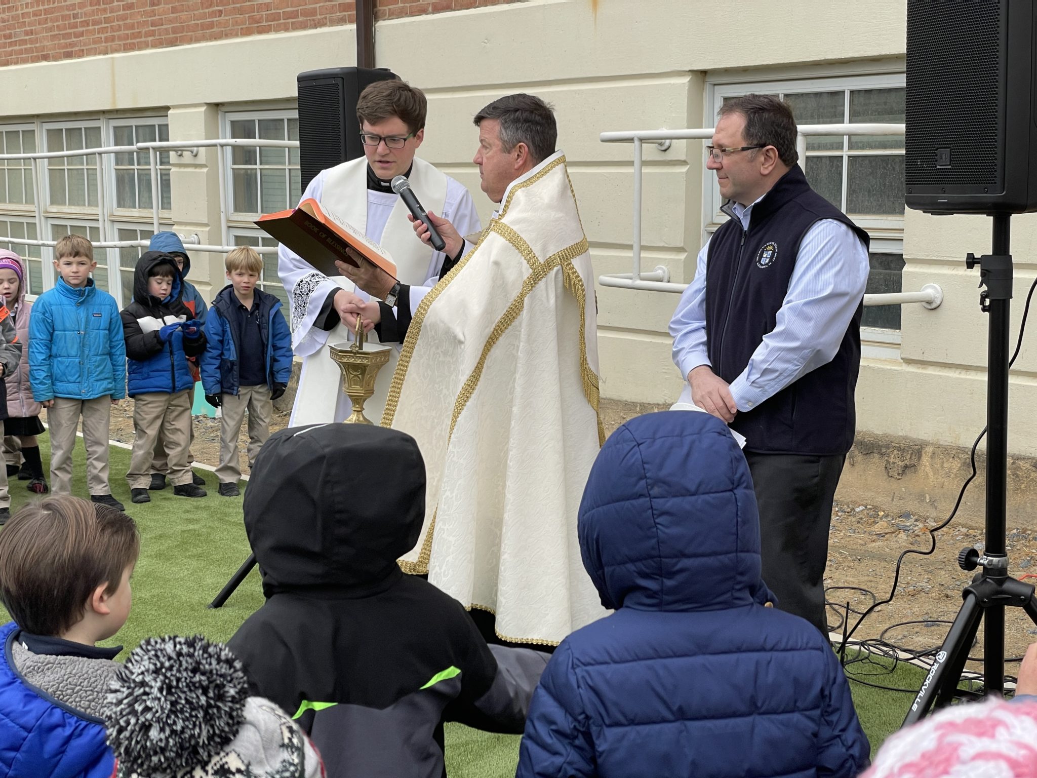 Father Hathaway and Father Peter Bless The Basilica School’s Playground ...
