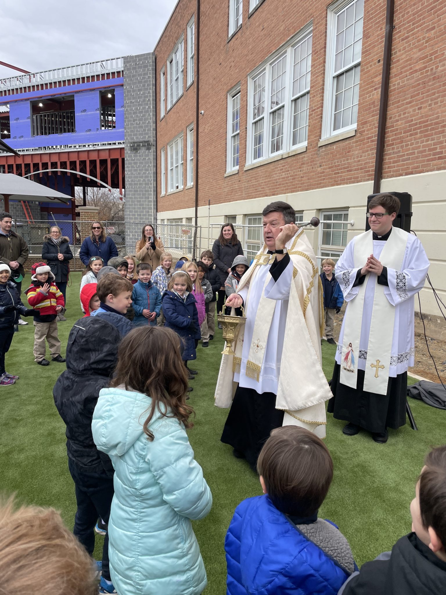 Father Hathaway and Father Peter Bless The Basilica School’s Playground ...