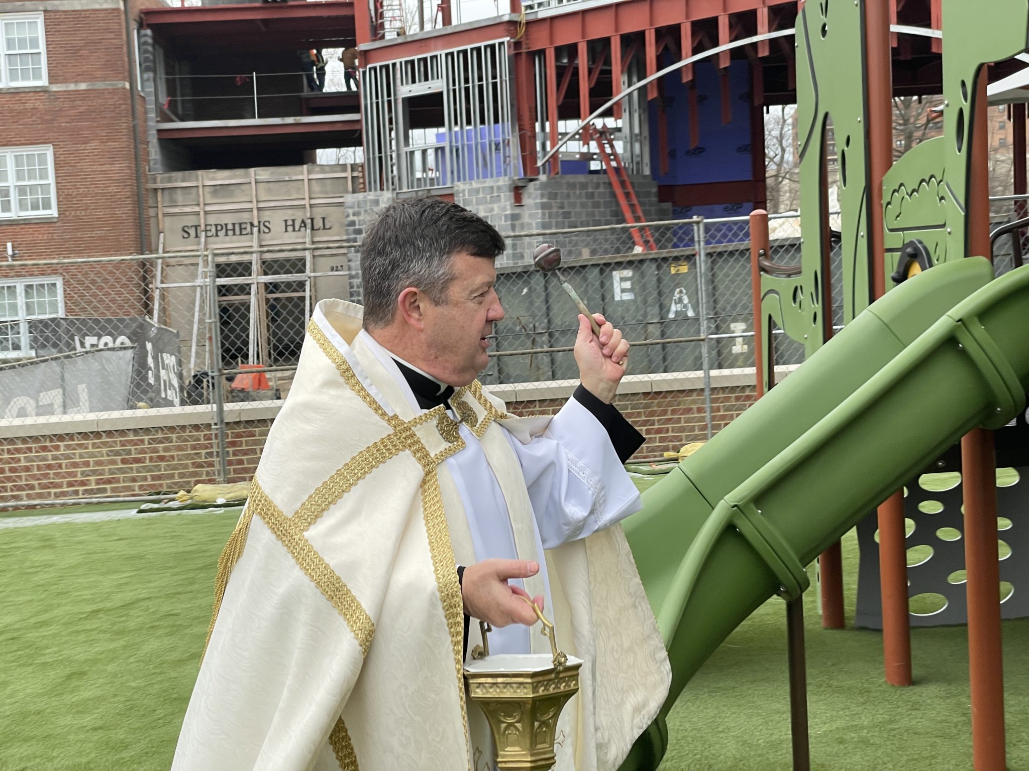 Father Hathaway and Father Peter Bless The Basilica School’s Playground ...